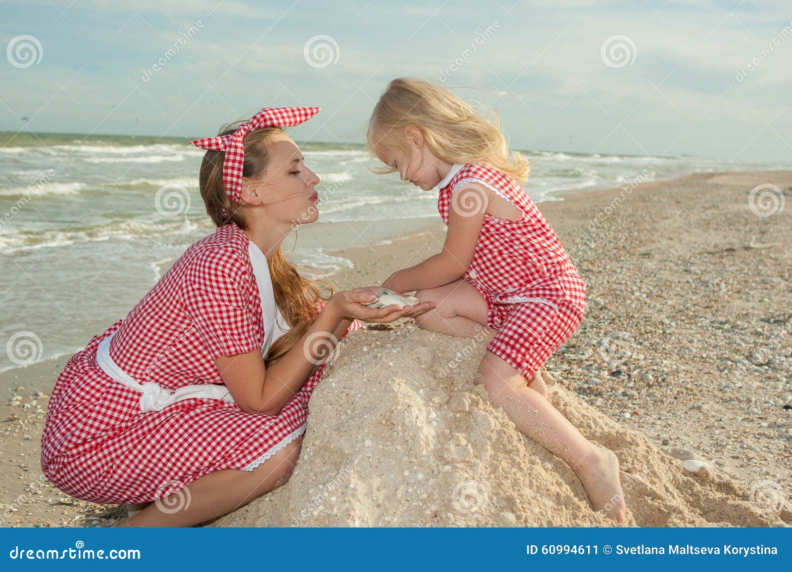 Mother And Her Daughter Having Fun On The Beach Stock Image Image Of