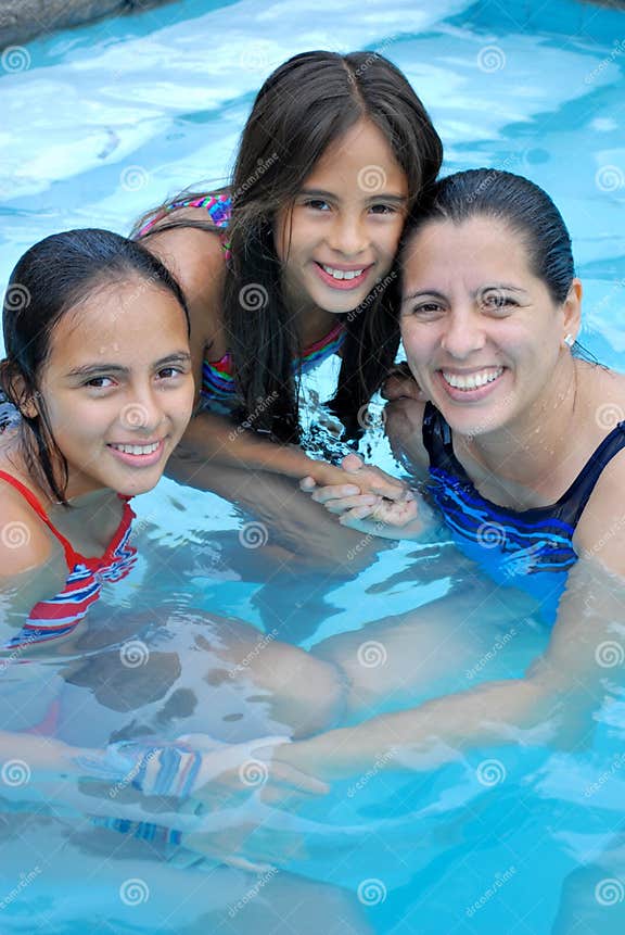 Mother with Her Daughters in the Pool. Stock Image - Image of caucasian ...