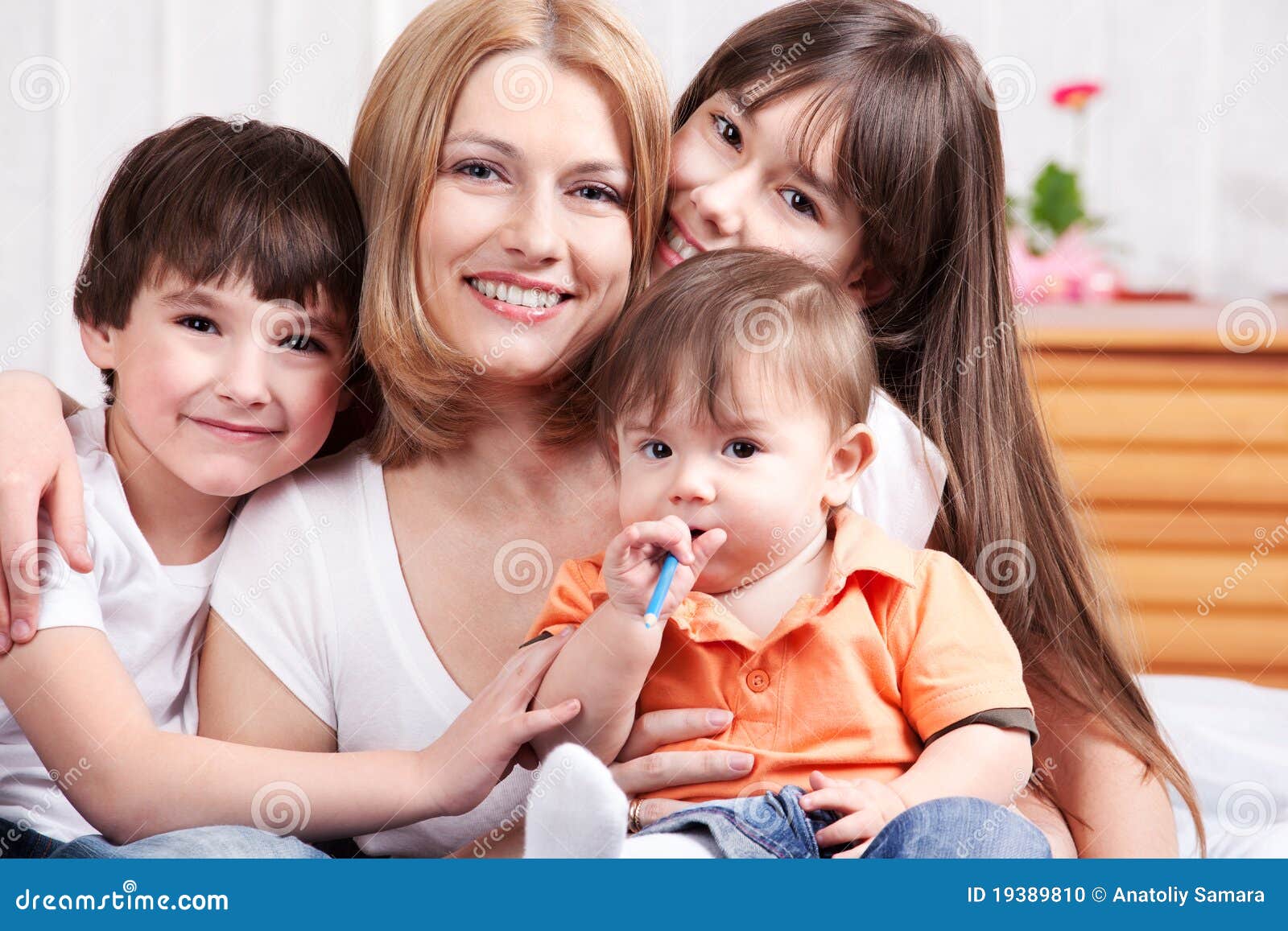 Mother and her offsprings stock photo. Image of indoors - 19389810