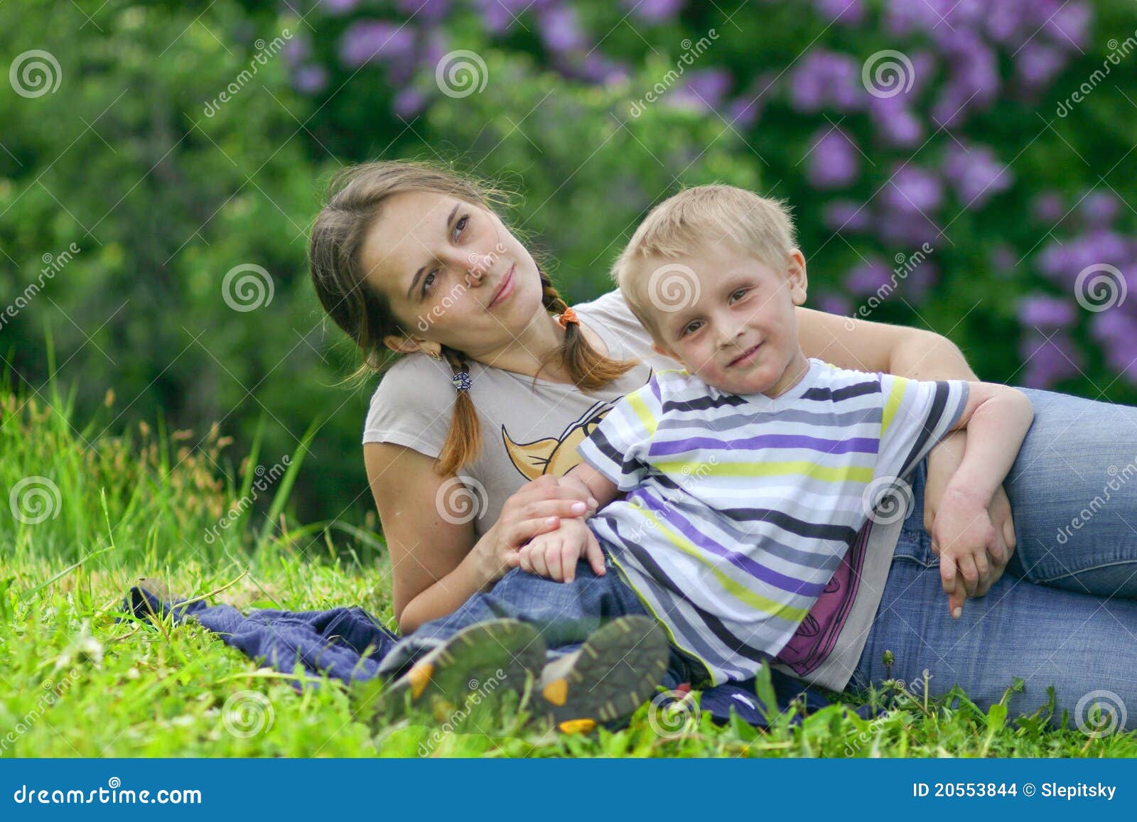 Mother and Her Son Having Rest in Spring Park Stock Photo - Image of ...