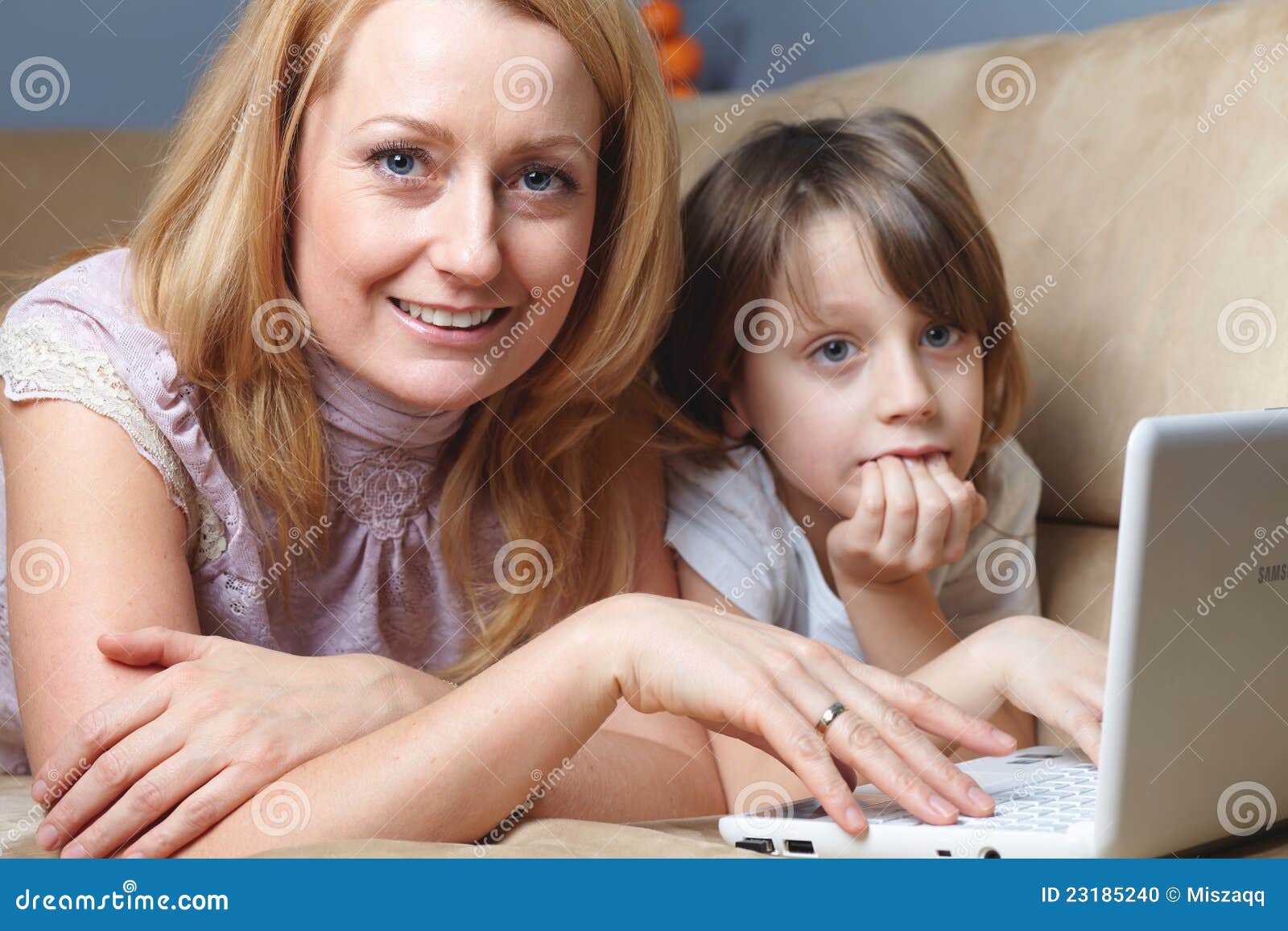 Mother with Her Son Work on Netbook Computer Stock Photo - Image of ...