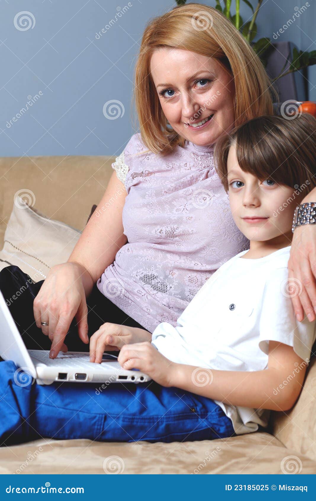 Mother with Her Son Work on Two Netbook Computers Stock Image - Image ...