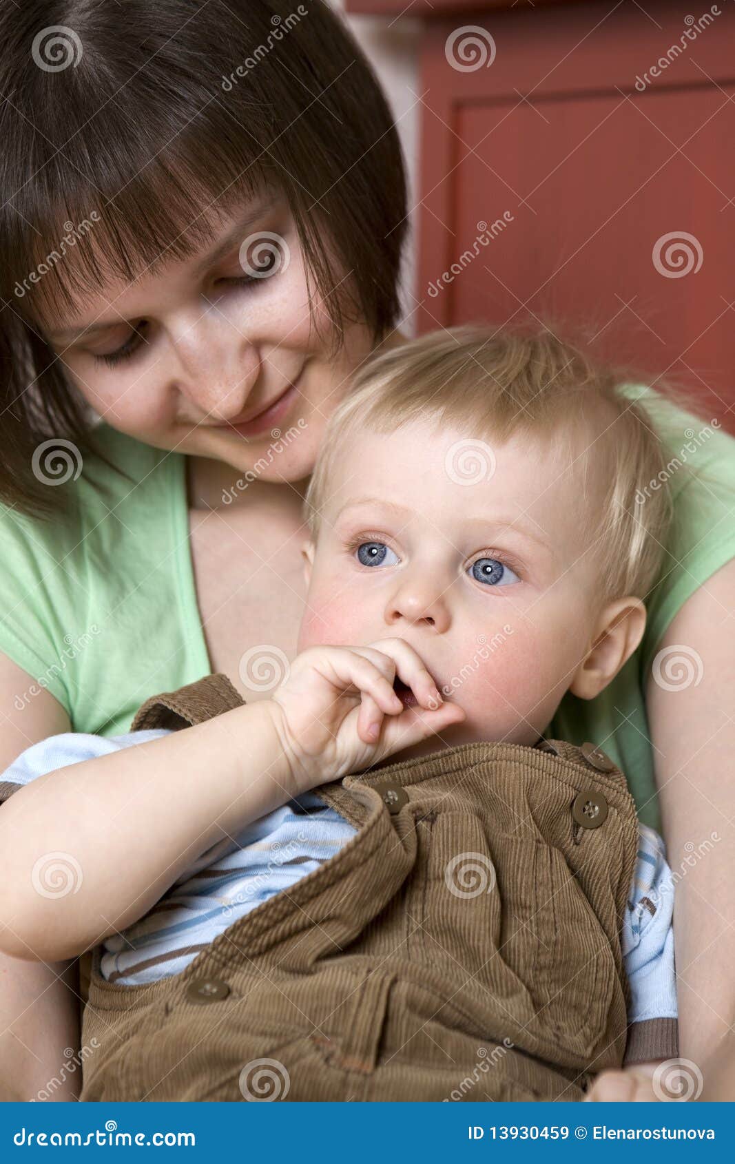 Mother hold her baby boy stock image. Image of mother - 13930459