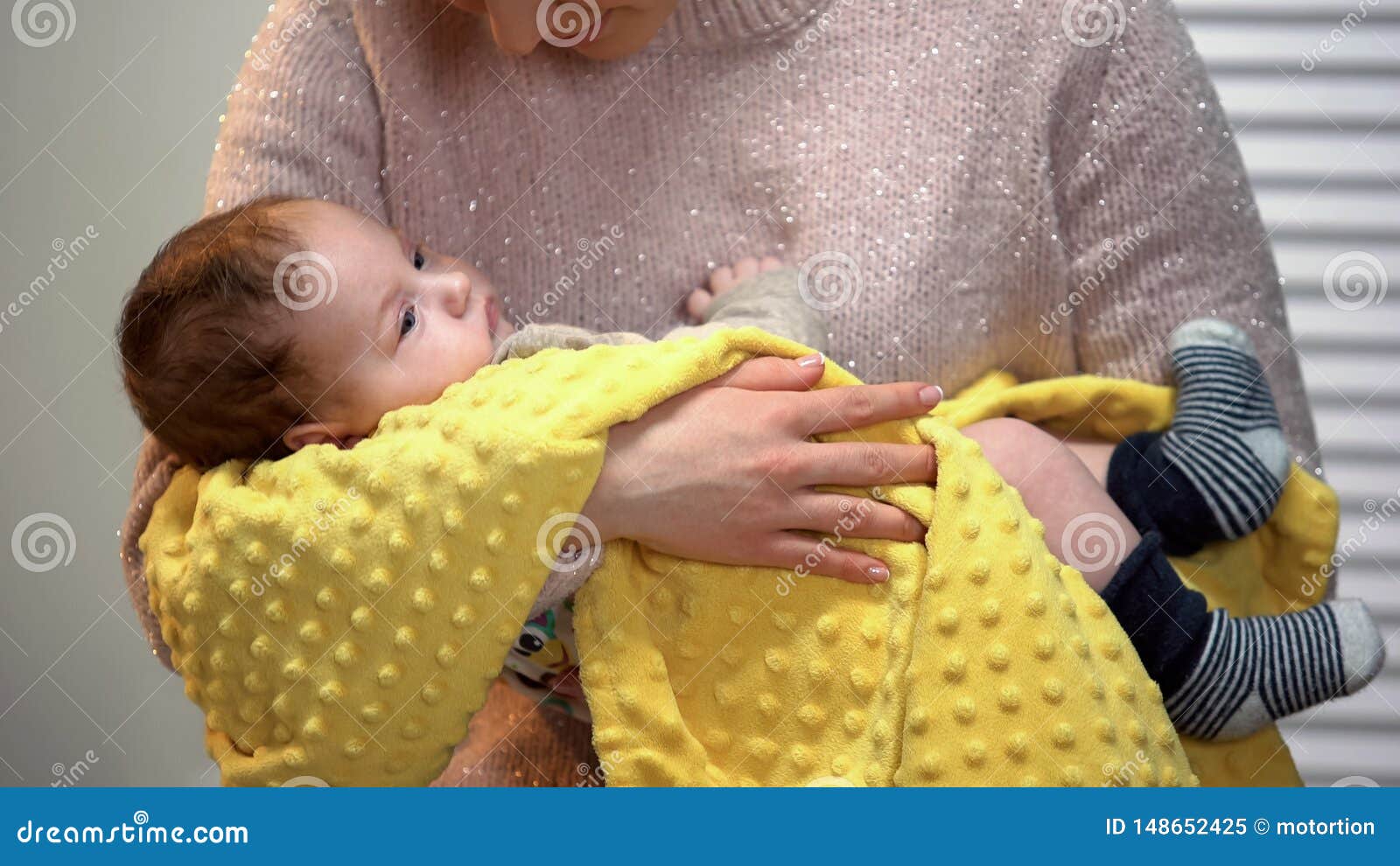 Mother Holding Adorable Newborn, Singing Lullaby To Calm Baby, Happy ... Mother Holding Adorable Newborn, Singing Lullaby To Calm Baby, Happy ...