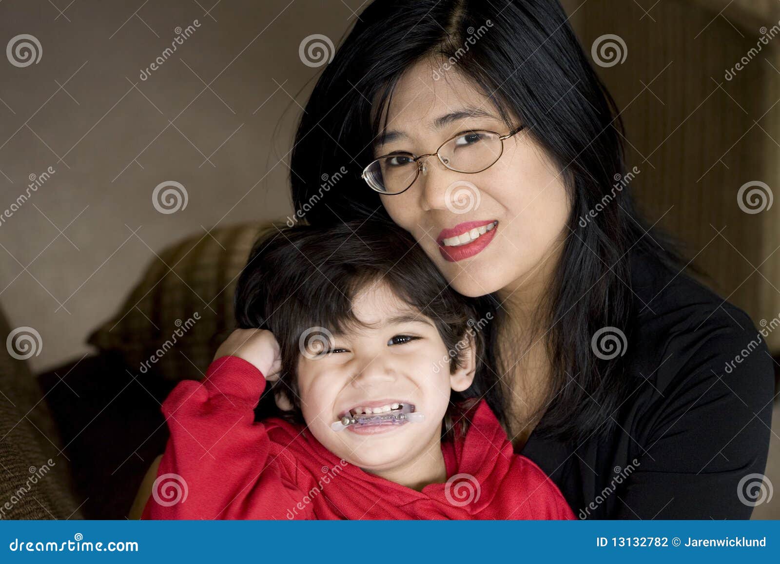 Mother Holding Disabled Son Stock Photo - Image of female, handicapped ...