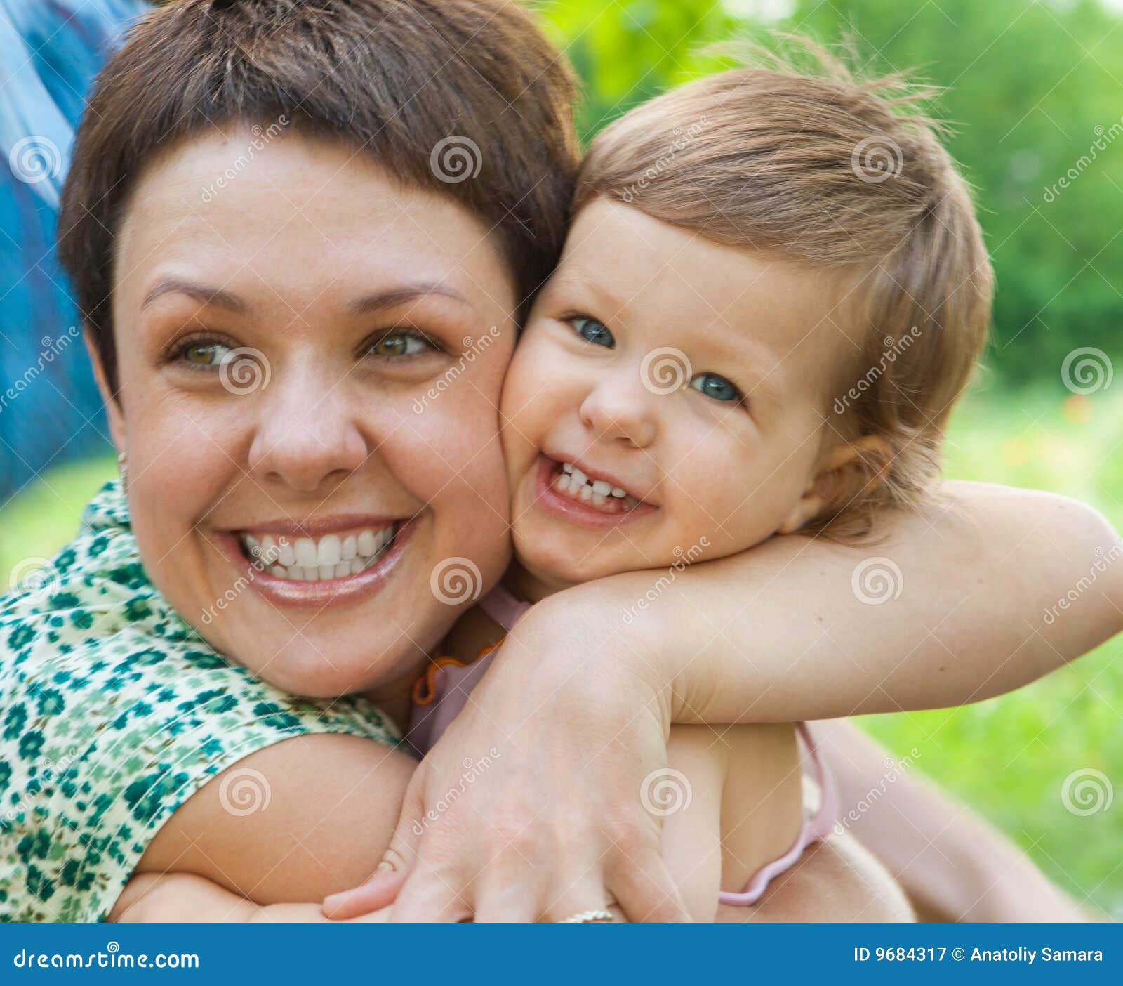 Mother hugging baby stock image. Image of cheerful, portrait - 9684317