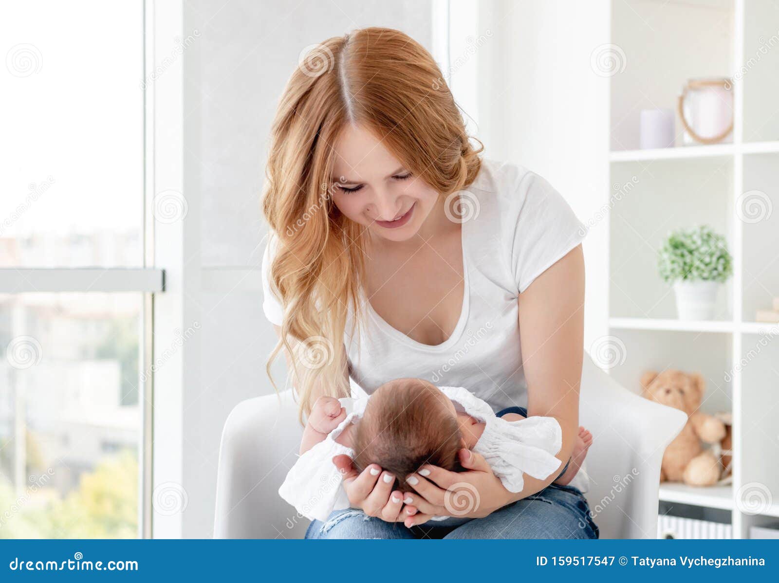 Mother hugging baby stock image. Image of mother, home - 159517547