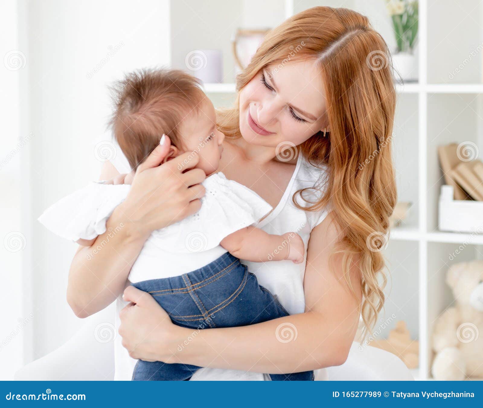 Mother hugging baby stock image. Image of birth, hugging - 165277989