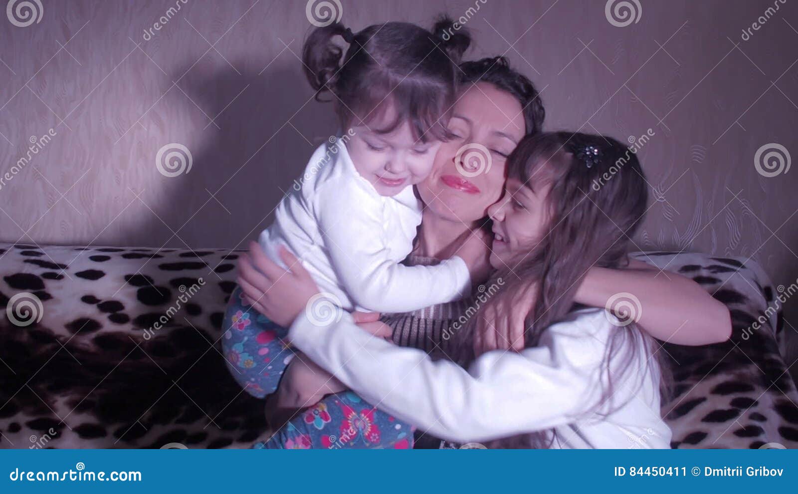 Mother hugging children. stock video. Video of living - 84450411