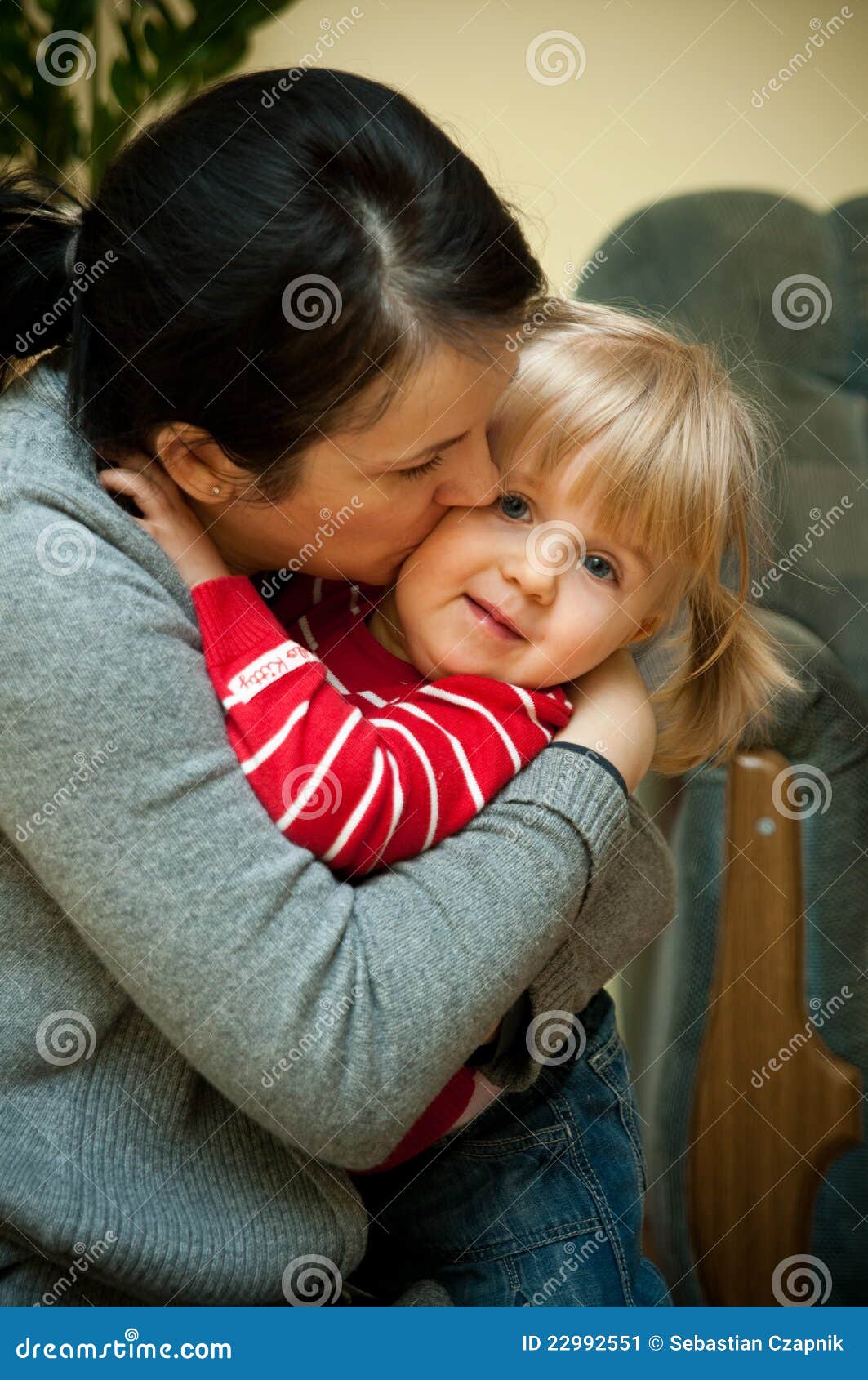 Mother hugging daughter stock image. Image of affectionate - 22992551