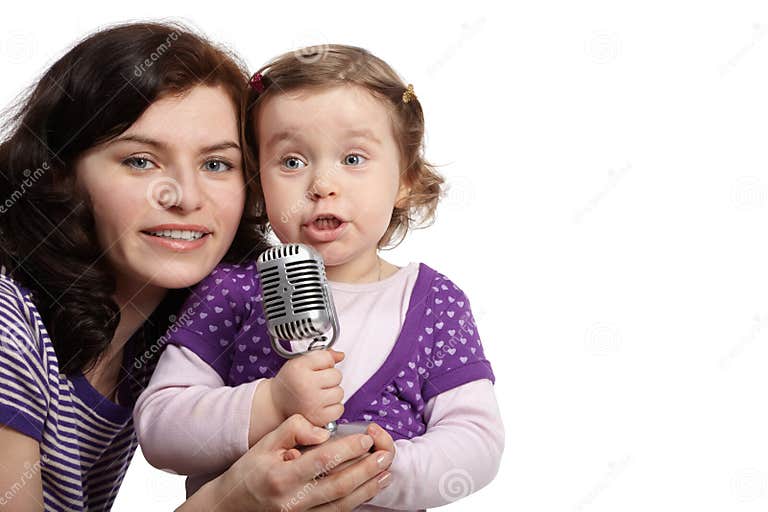 Mother Hugs Daughter, Which Sings into Microphone Stock Image - Image ...