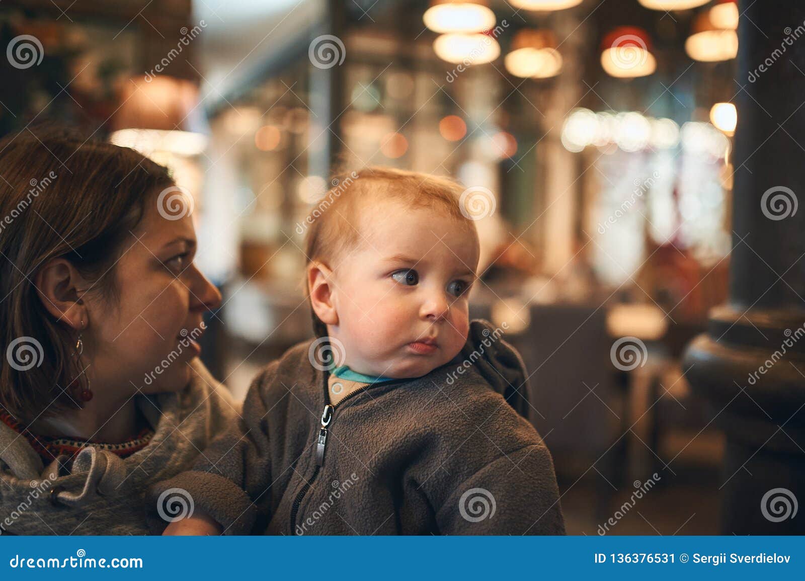 Mother with Infant in Cafe Waiting for Order Stock Image - Image of ...