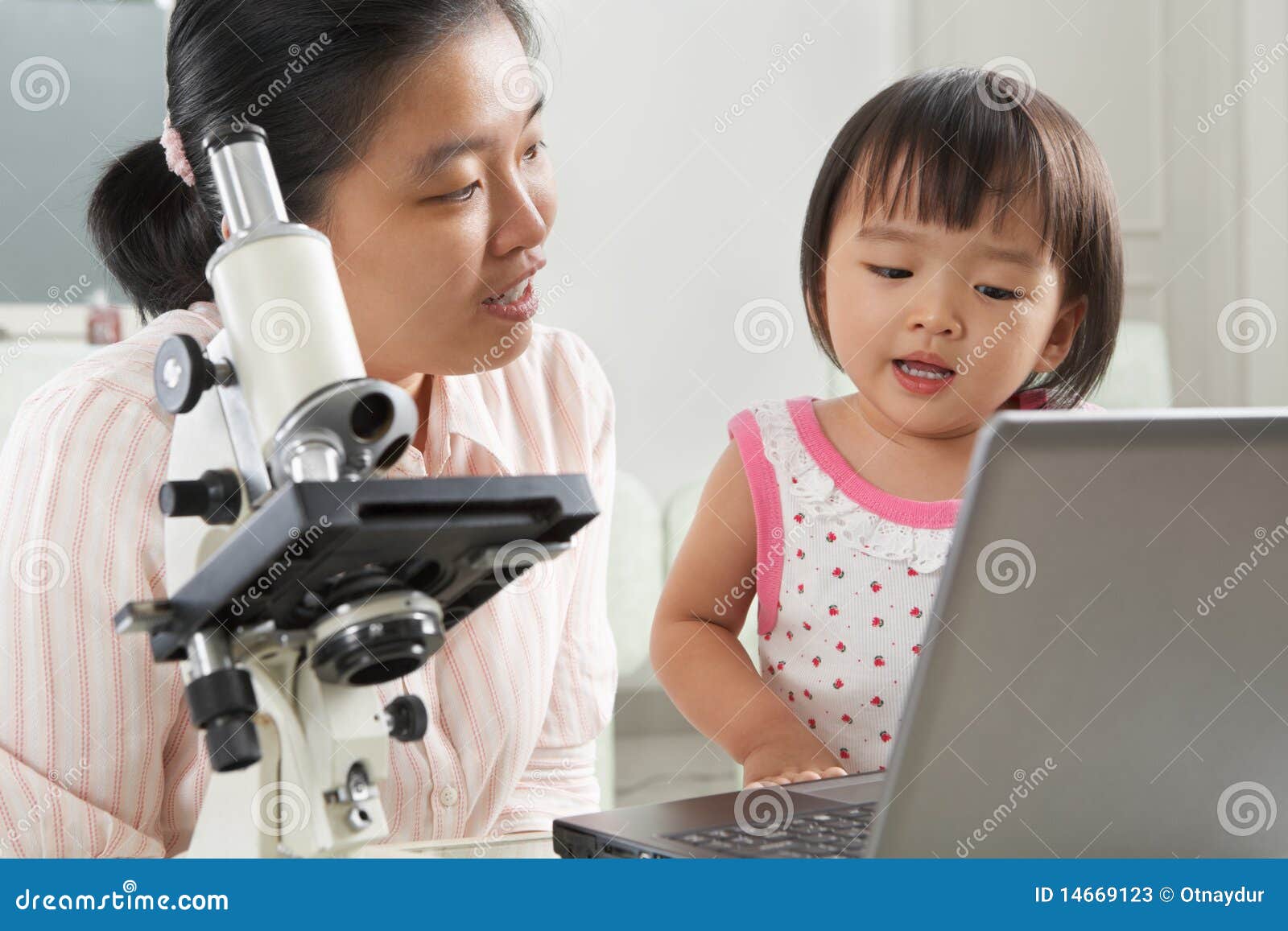Mother Introduce Technology To Her Daughter Stock Image - Image of ...