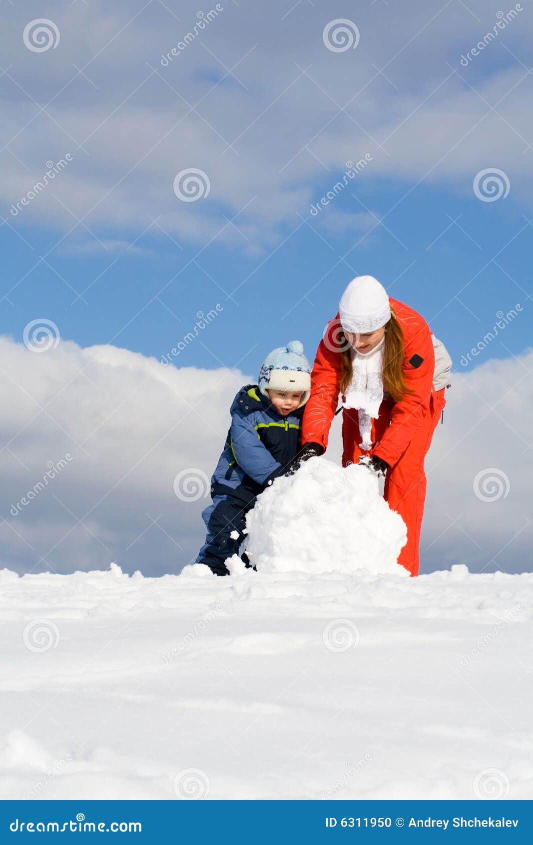 Mother with Kid Making Snowman Stock Photo - Image of activity, nature ...