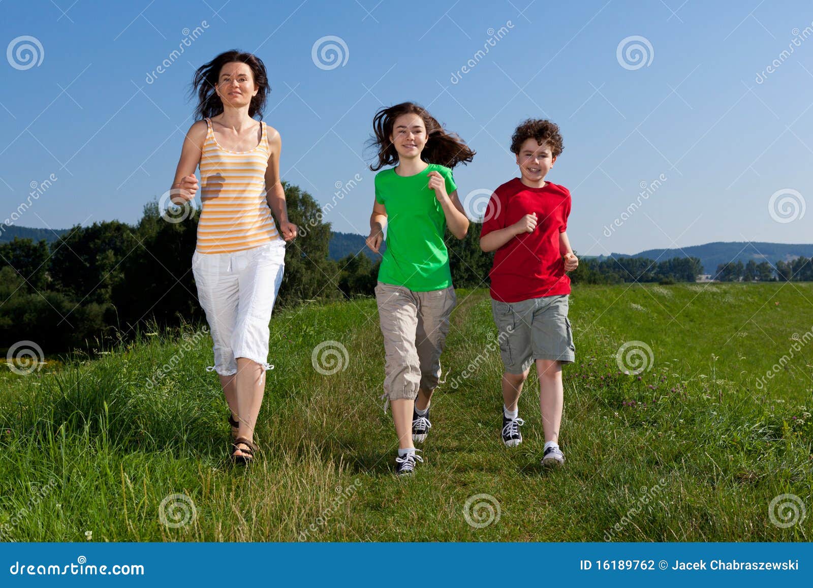 Mother with kids running stock photo. Image of children - 16189762