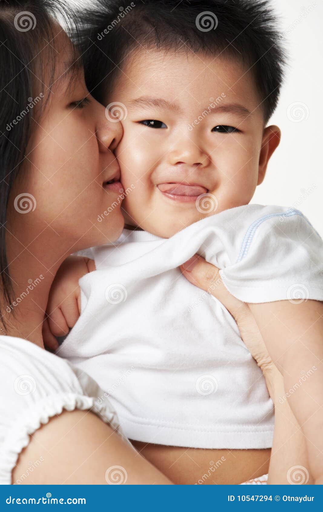 Mother Kiss And Breast Feeding Her Baby Girl Royalty-Free Stock ...