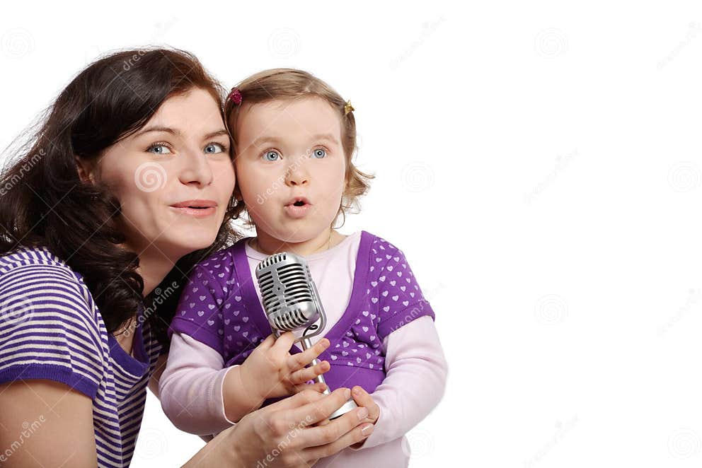 Mother with Little Daughter Sing into Microphone Stock Photo - Image of ...