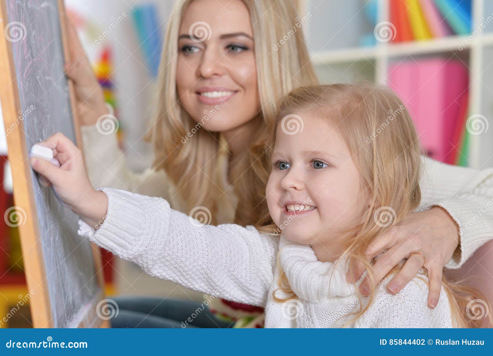 Mother with Little Daughter Writing Stock Photo - Image of generations ...