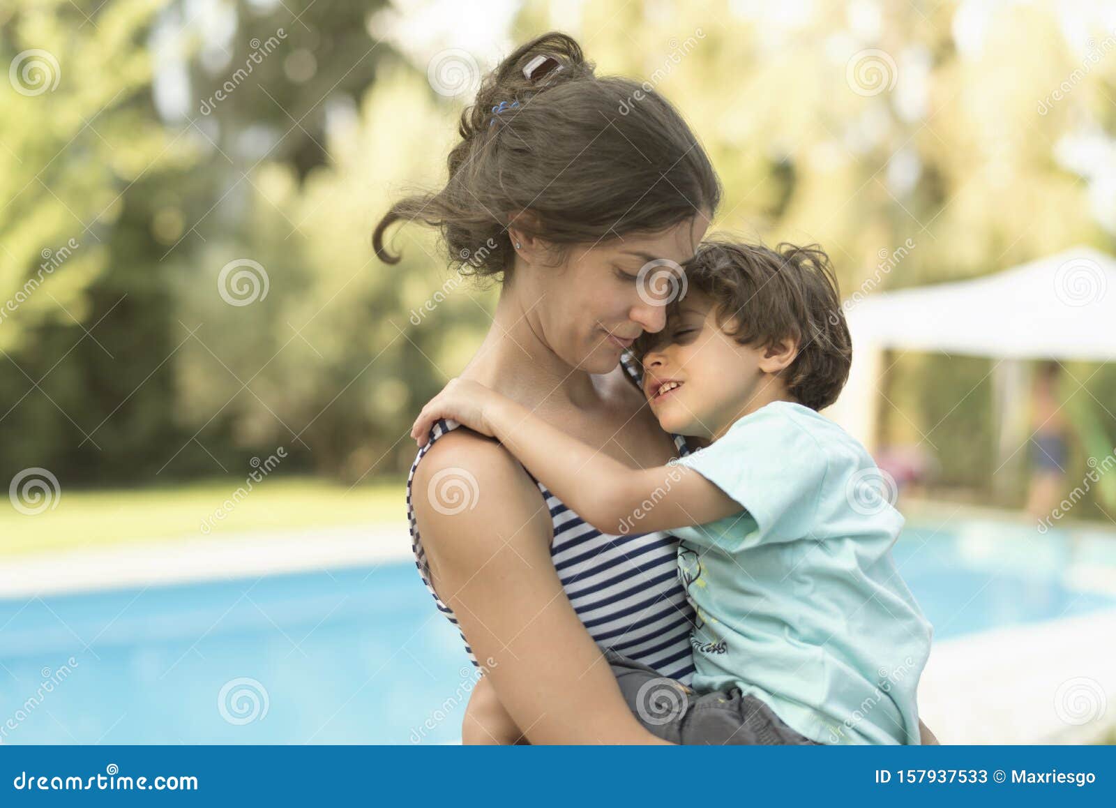 Mother and Little Son Hug in Backyard Stock Image - Image of disheveled ...