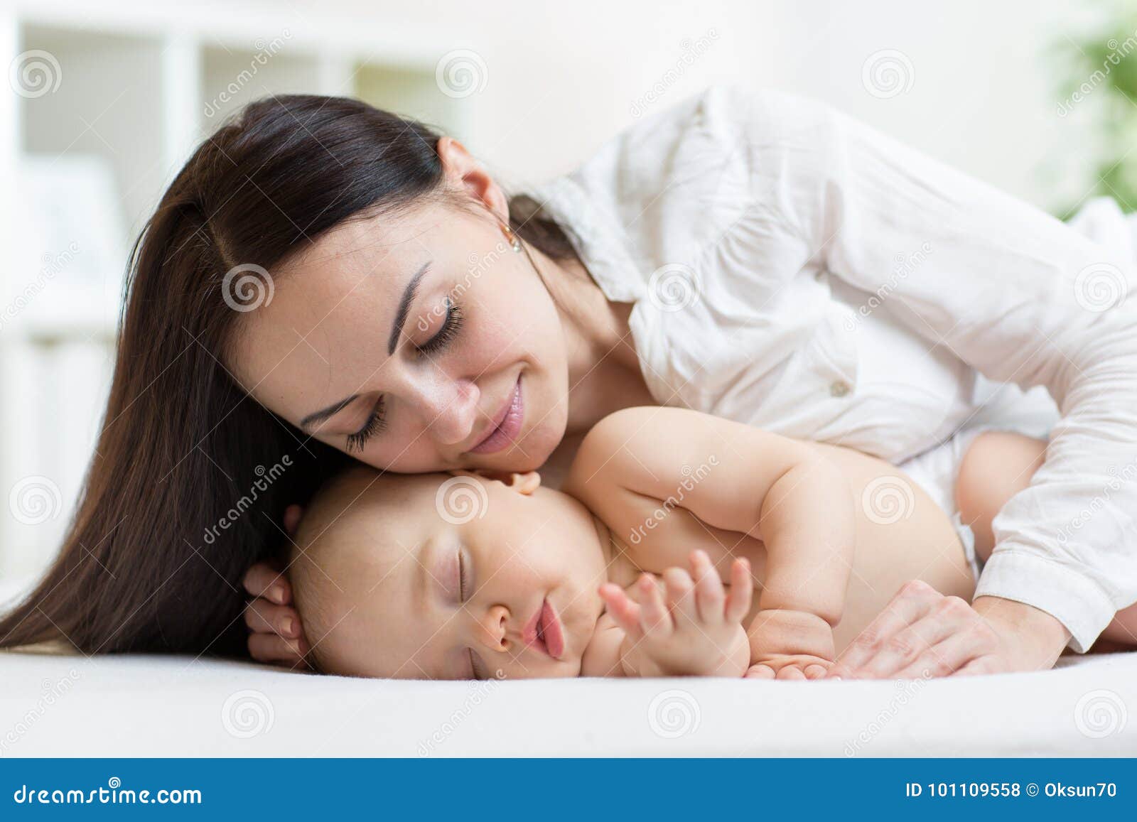 Mother Looking at Her Sleeping Newborn Baby Stock Photo - Image of body ...