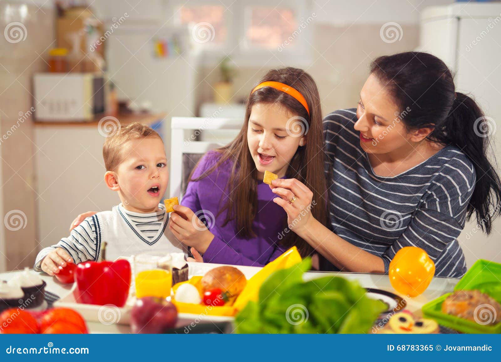 Mother Making Breakfast for Her Children in the Morning at Home Stock ...