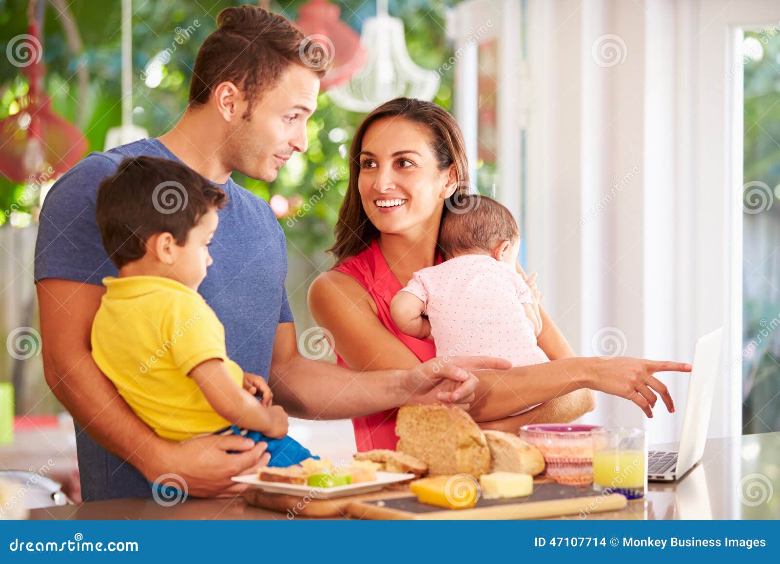 Mother Making Snack for Family in Kitchen Stock Photo - Image of four ...