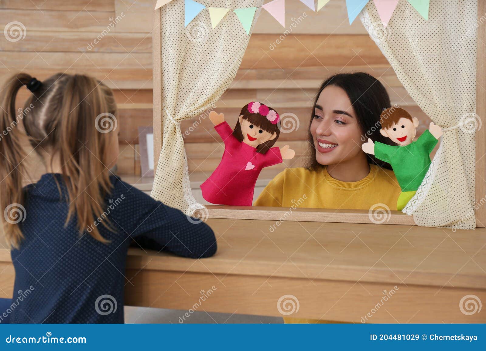 Mother Performing Puppet Show for Her Daughter at Home Stock Image ...