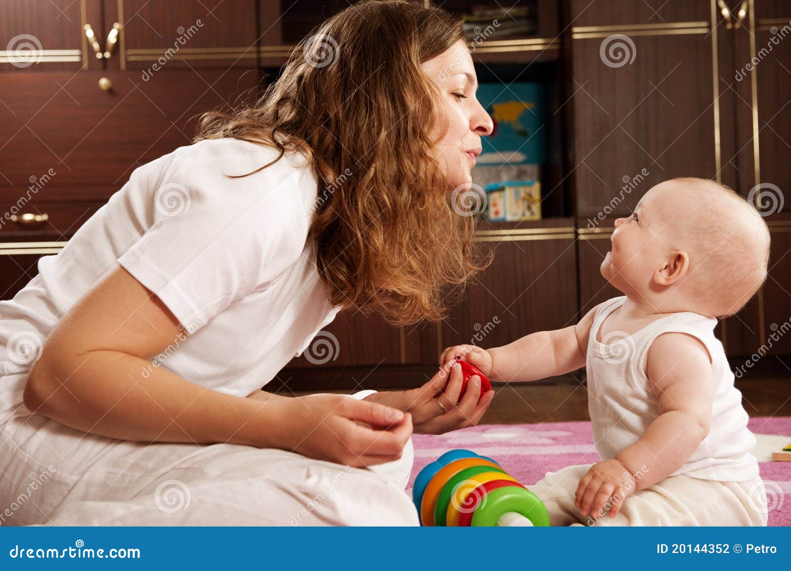 Mother playing with baby stock photo. Image of caucasian - 20144352