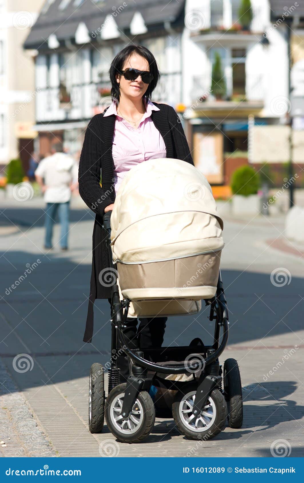 Mother with pram stock image. Image of smiling, mother - 16012089
