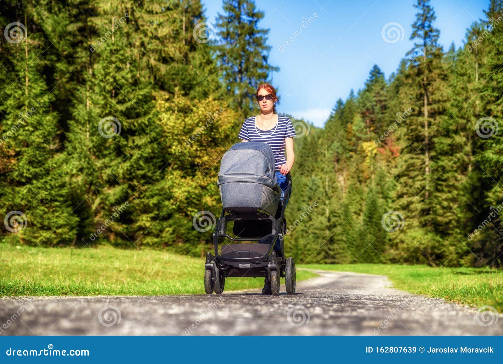 Mother with pram stock image. Image of care, child, outdoor - 162807639