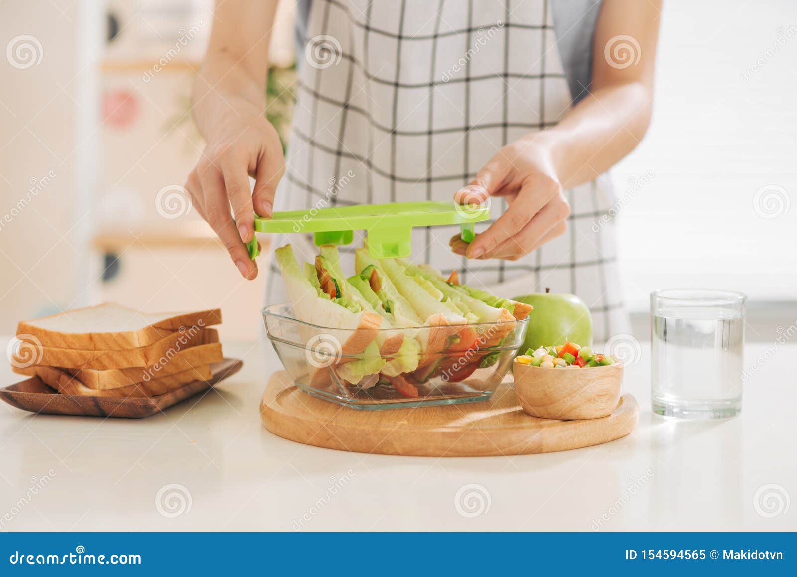 Mother Preparing Sandwich for School Lunch on Table Stock Image - Image ...