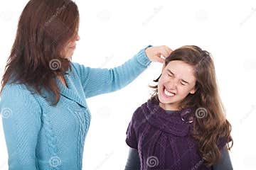 Mother Pulling Her Daughter S Ear Stock Image - Image of adult, person ...