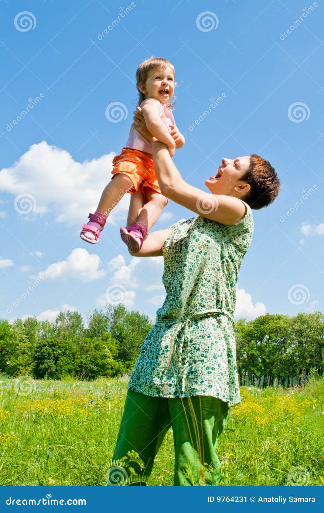 Mother raising baby stock image. Image of life, leisure - 9764231