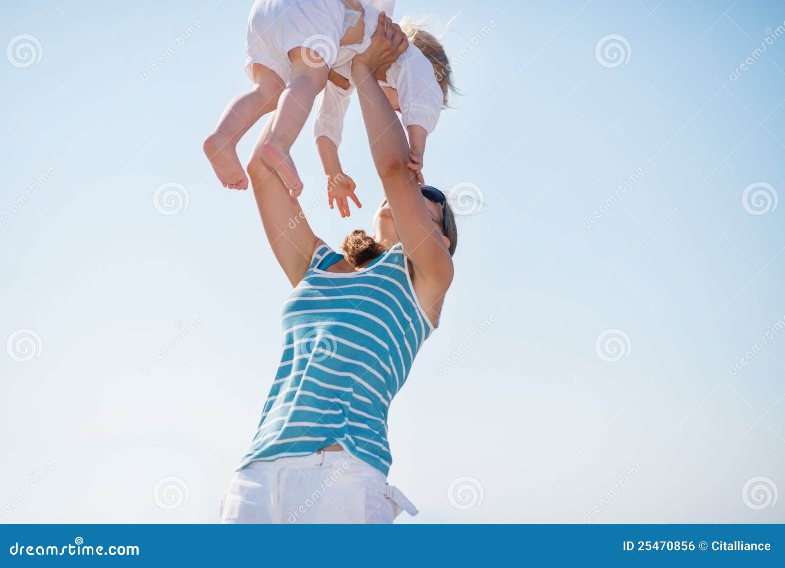 Mother raising baby in sky stock photo. Image of lifestyle - 25470856