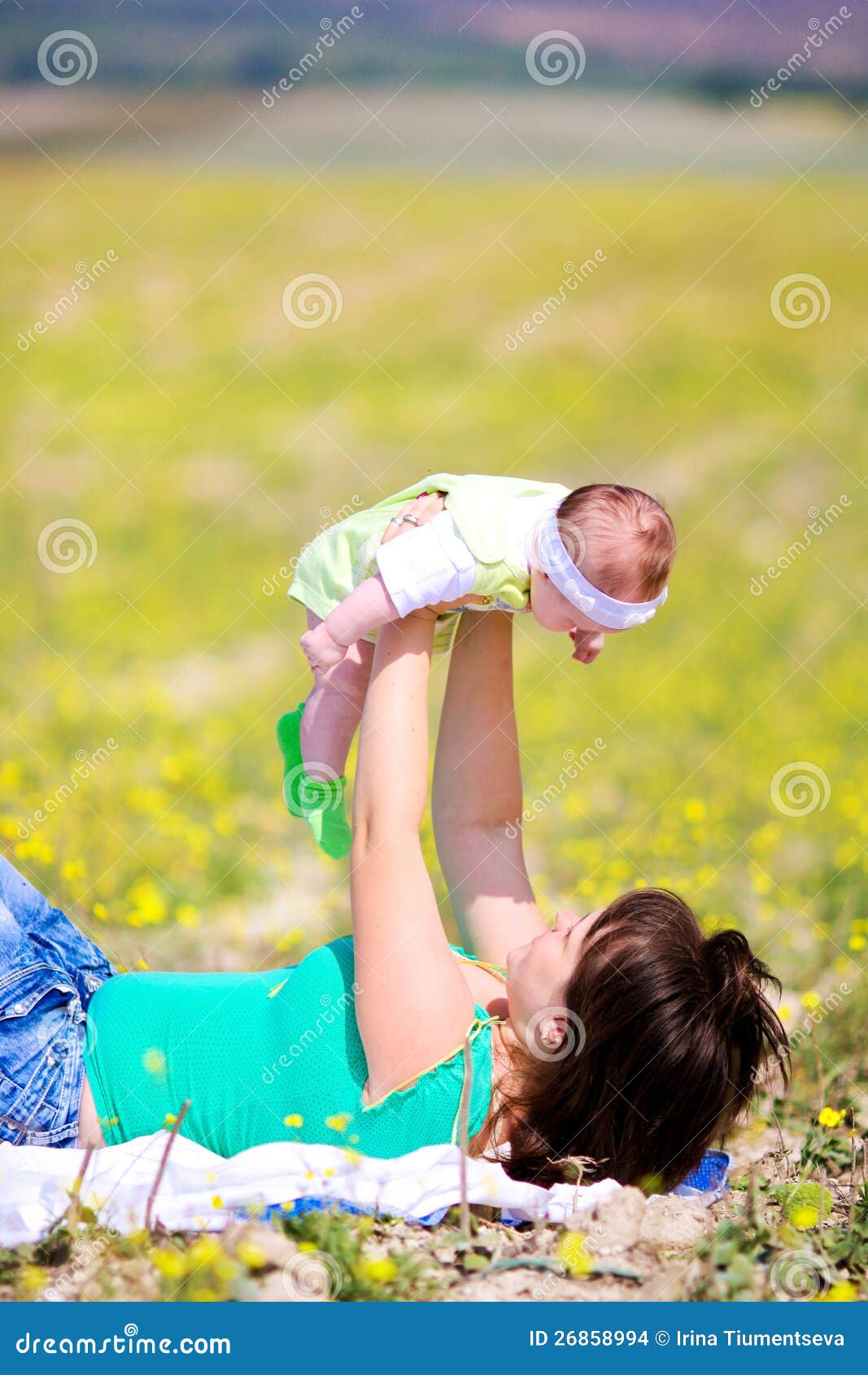 Mother Raising Her Little Daughter Up Stock Photo - Image of bright ...
