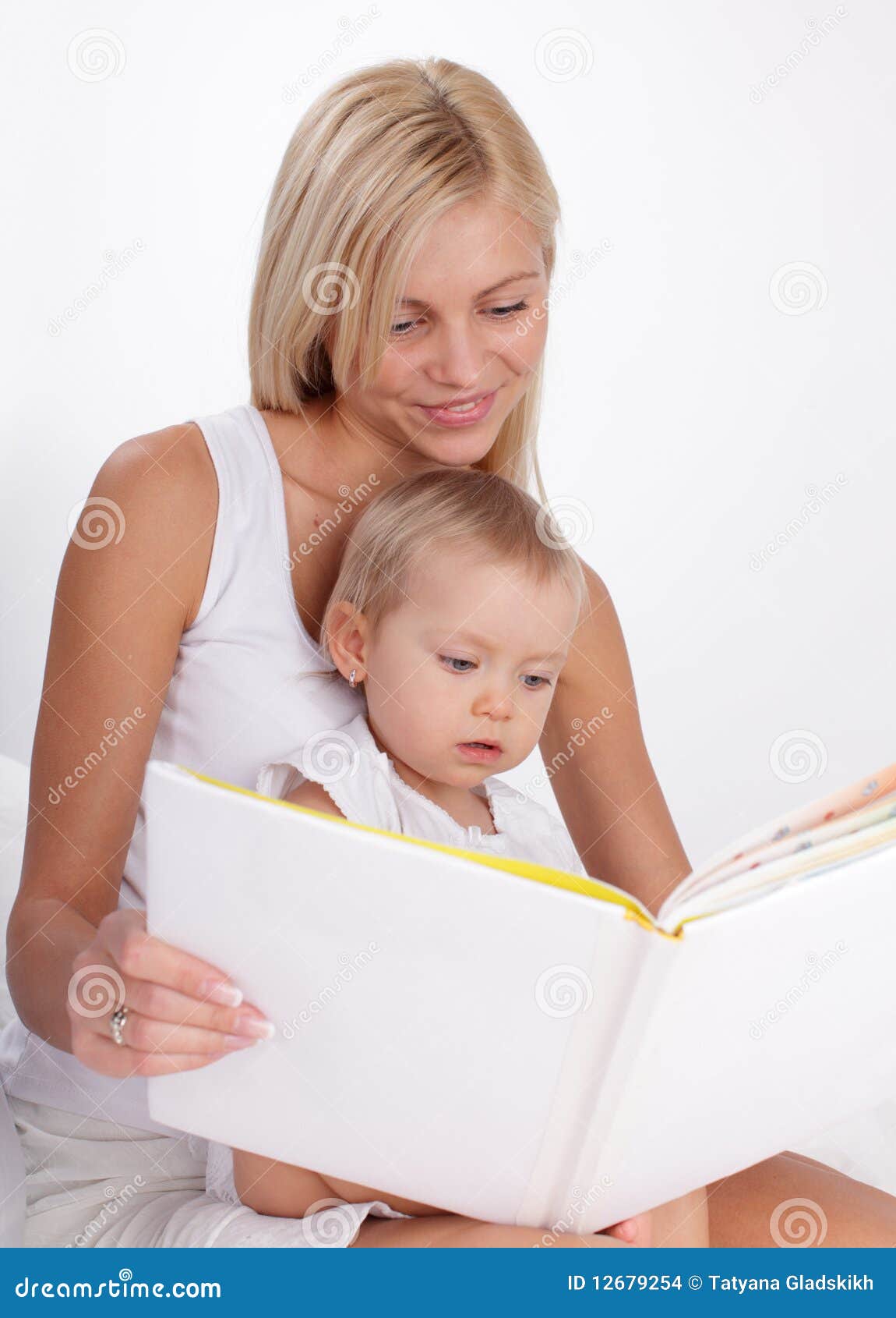 Mother Reading Book To a Daughter Stock Photo - Image of child ...