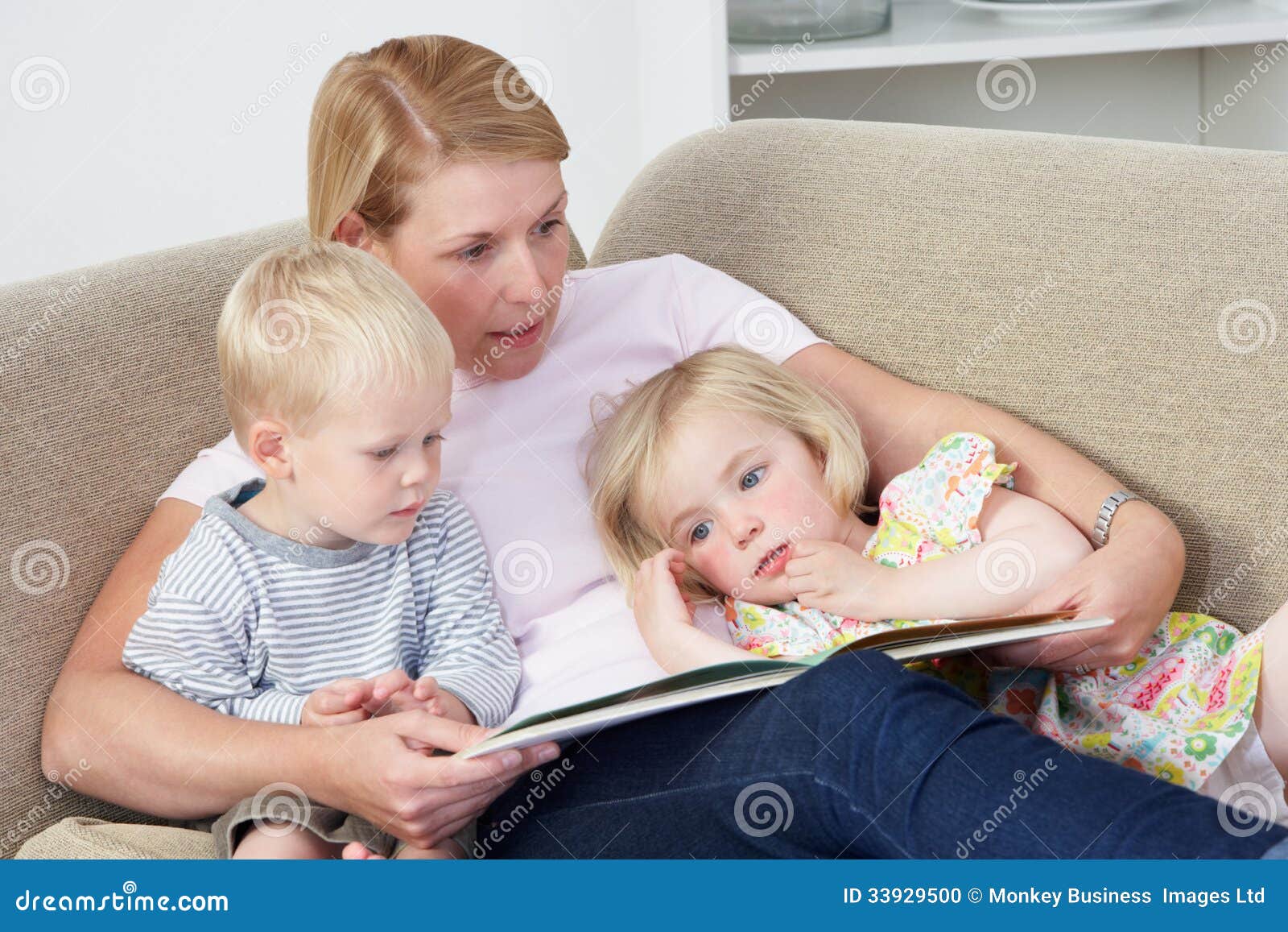 Mother Reading To Children at Home Stock Photo - Image of women, female ...