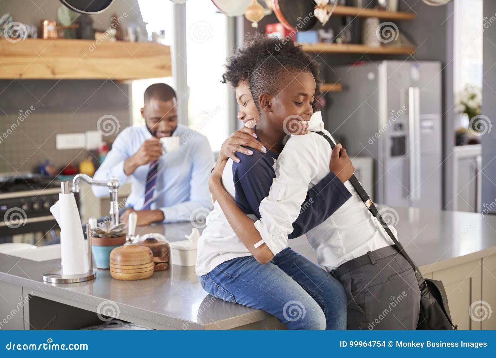 Mother Saying Goodbye To Son As she Leaves for Work Stock Photo - Image ...
