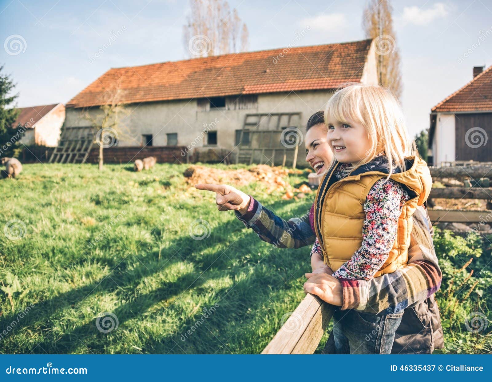 Mother Showing Child Something on Farm Stock Image - Image of family ...