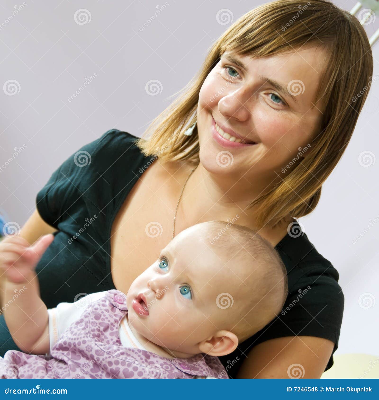 Mother Smiling and Baby Watching Stock Photo - Image of faces, babies ...