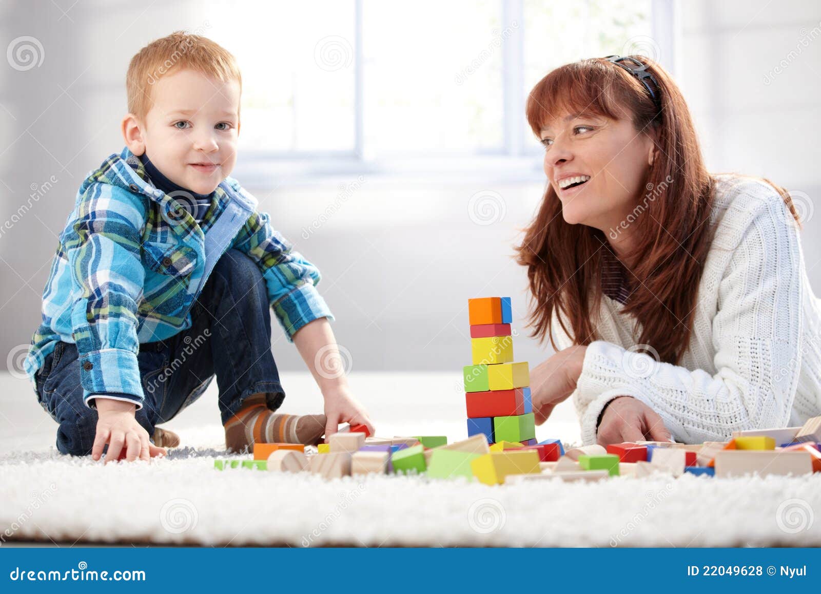 Mother and Son Building Tower Together Smiling Stock Photo - Image of ...