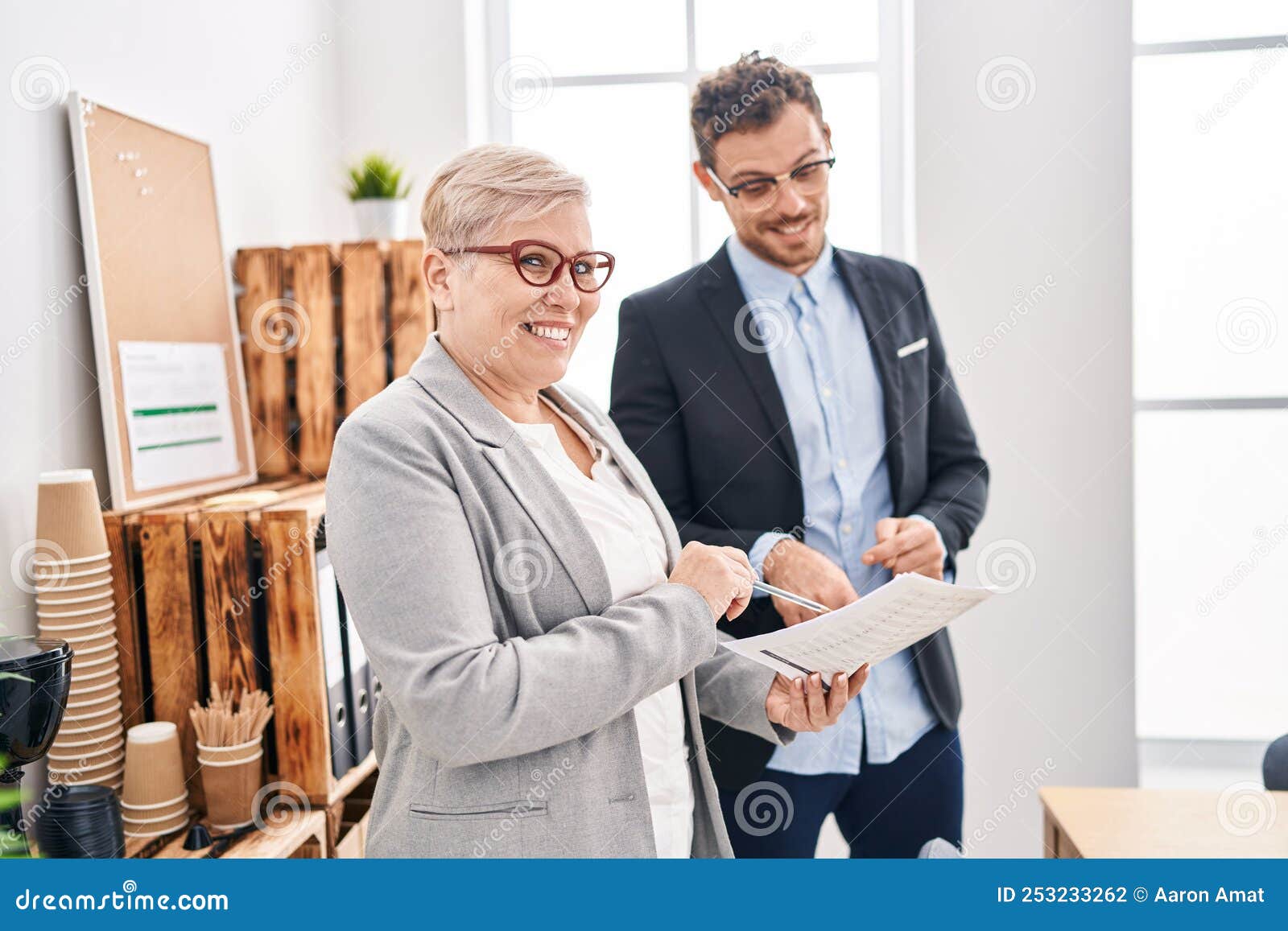 Mother and Son Business Workers Reading Document at Office Stock Photo ...