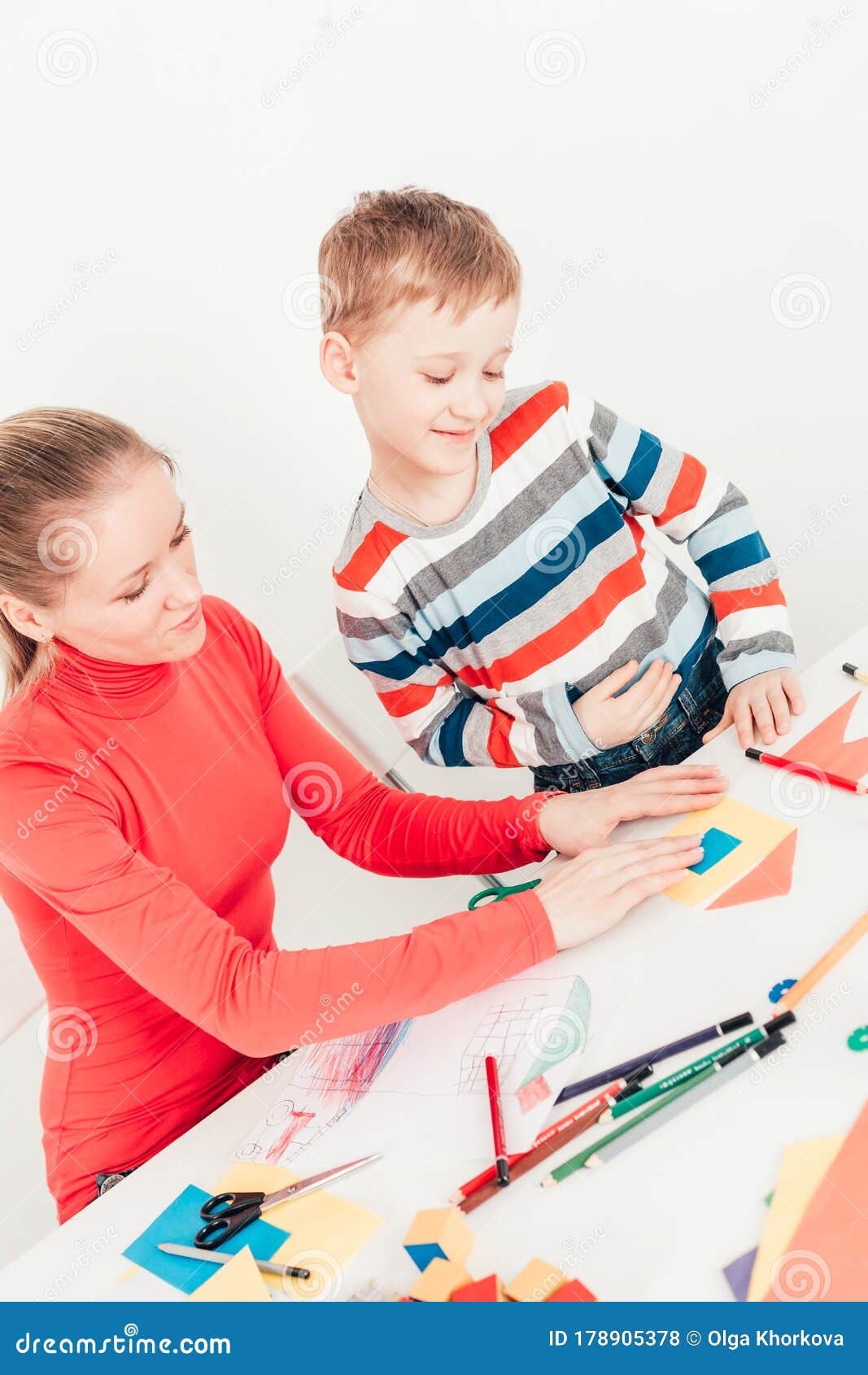 Mother with Son Doing Application Paper Picture Stock Photo - Image of ...