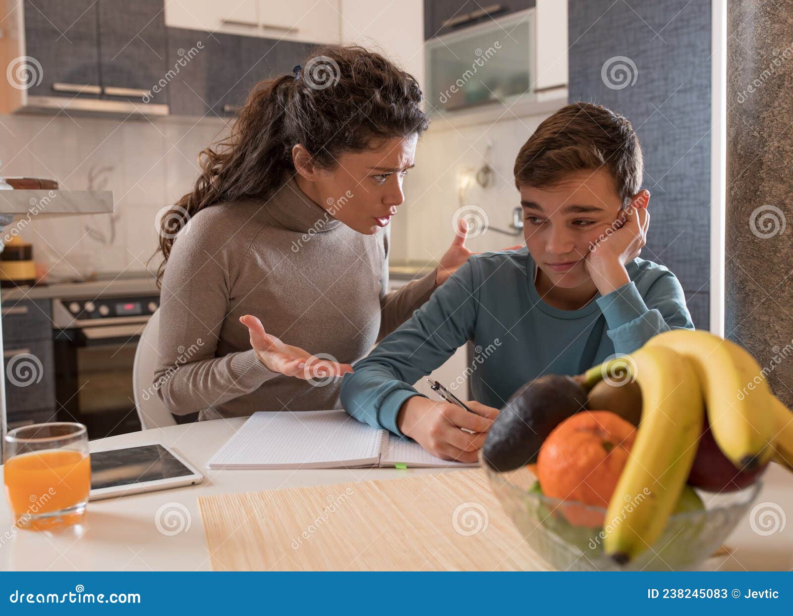 Mother and Son Doing Homework and Having Argument Stock Image - Image ...