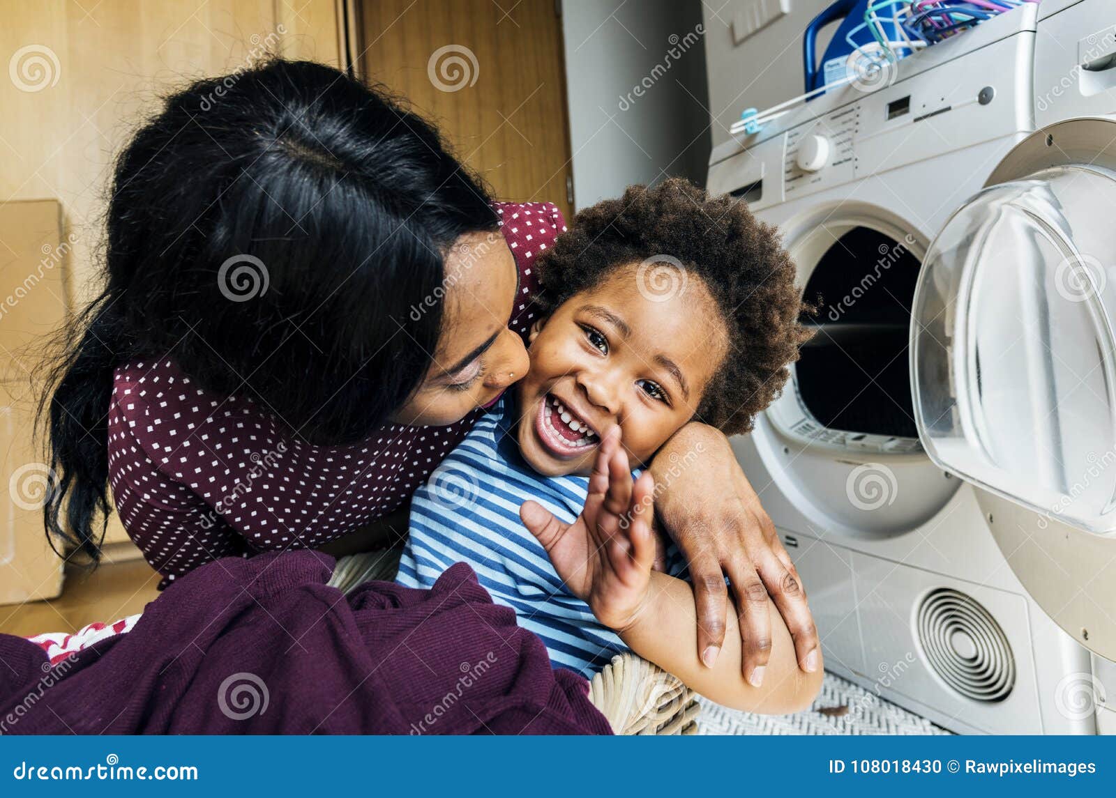 Mother and Son Doing Housework Together Stock Photo - Image of machine ...