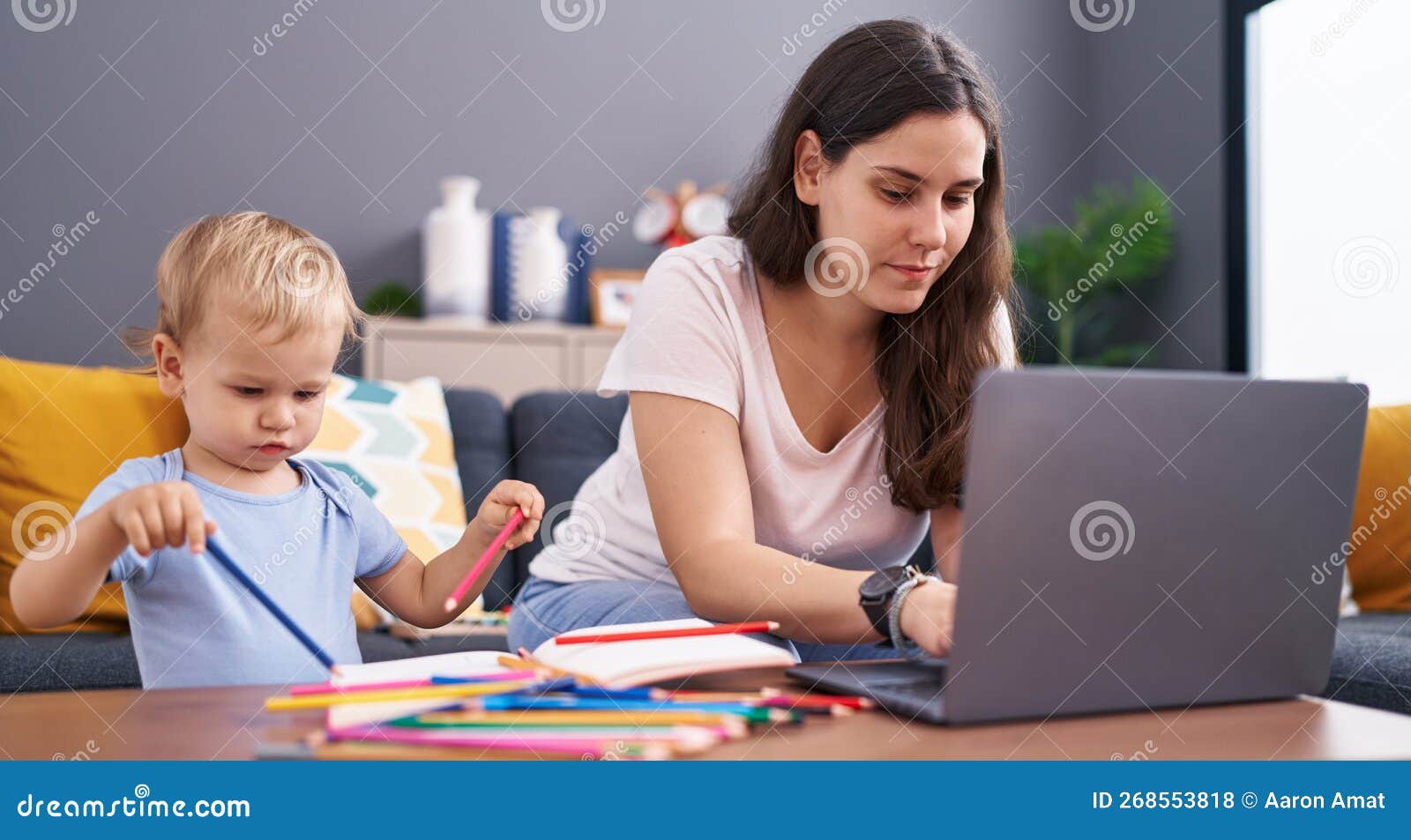 Mother and Son Drawing on Notebook Using Laptop at Home Stock Photo ...