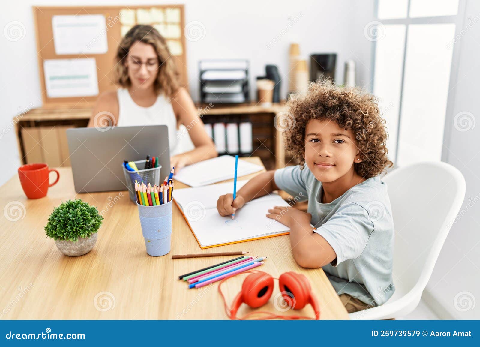 Mother and Son Drawing and Using Laptop Working at Office Stock Image ...