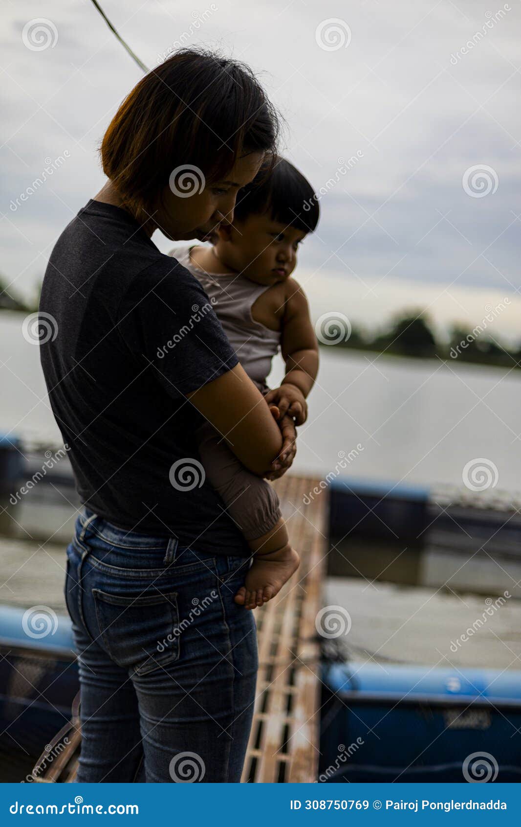 Mother and Son at the Fish Farm Stock Image - Image of male, child ...