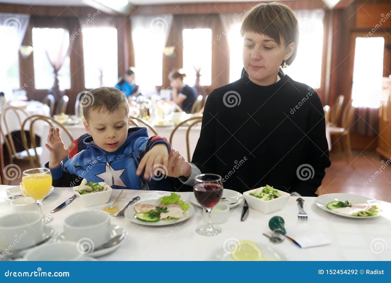 Mother with Son Have Supper Stock Photo - Image of indoor, female ...