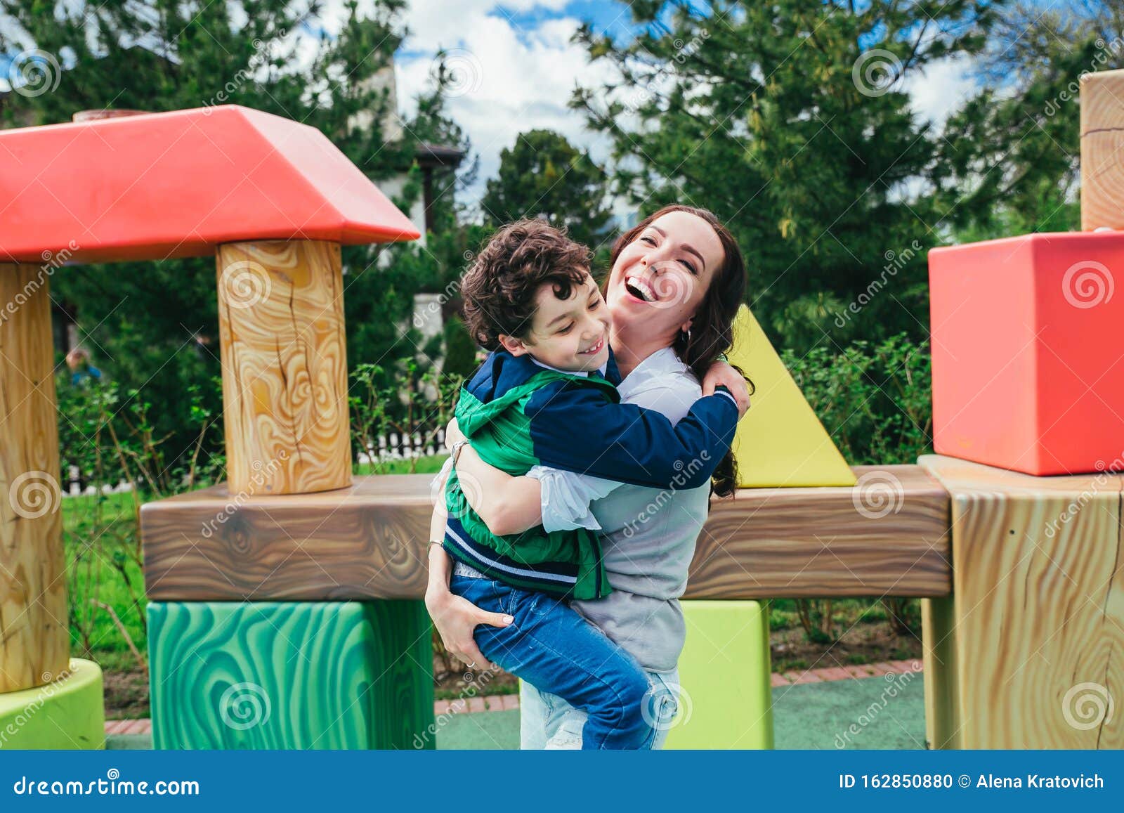 Mother and Son Having Fun in Amusement Park Stock Photo - Image of ...